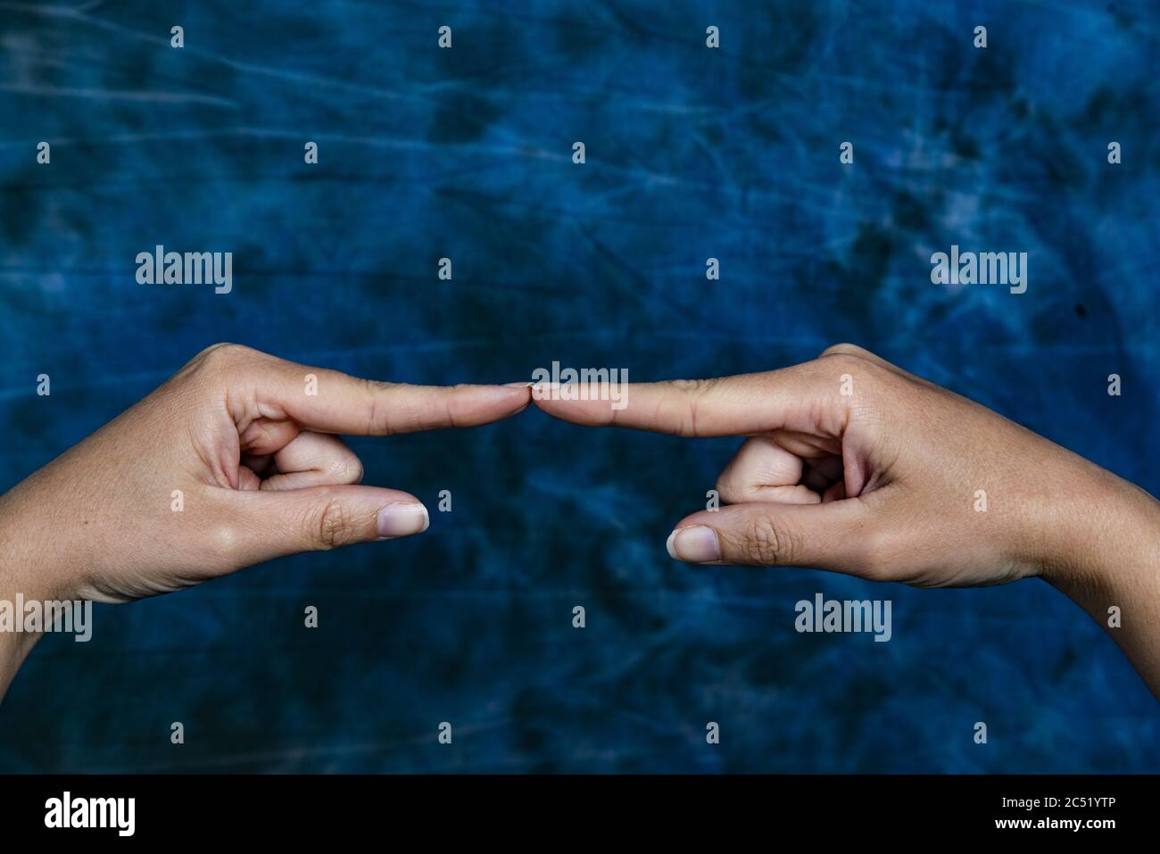 Two index fingers touching hi-res stock photography and images - Alamy
