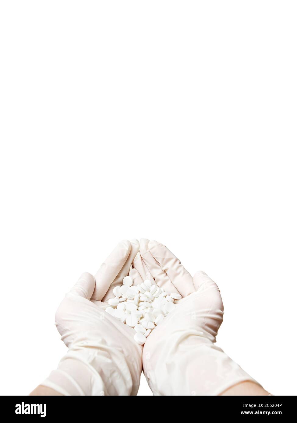 handful of white pills in hands in sterile gloves, mock up concept on ...