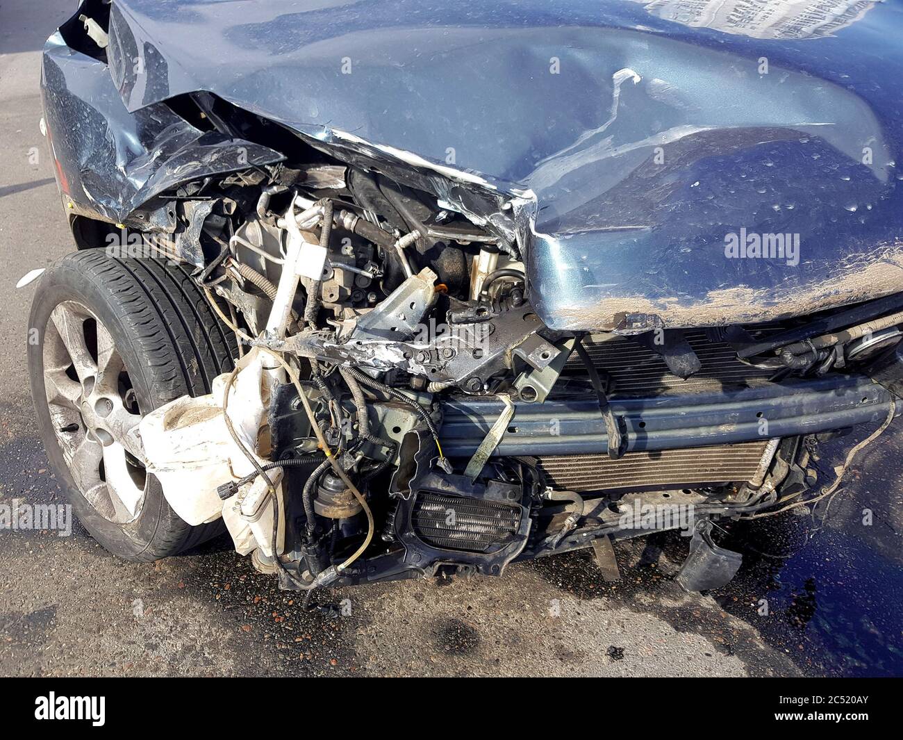 wrecked car frontal impact collision head on collision hood and injured ...