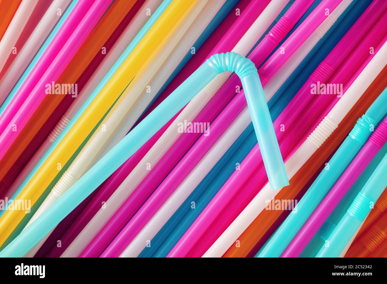 Colorful flexible drinking straws for multi color background use. Close ...