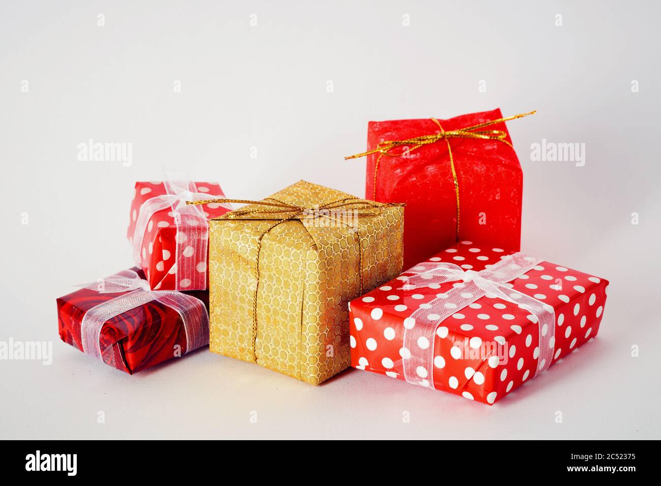 Colorful miniature gift boxes on white background Stock Photo - Alamy