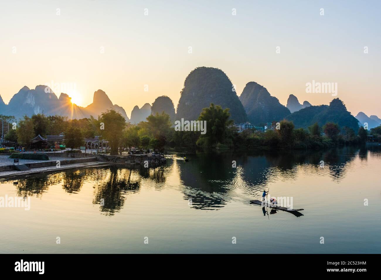 YANGSHUO, CHINA, 6 DECEMBER 2019: Beautiful sunset on the Yulong River ...