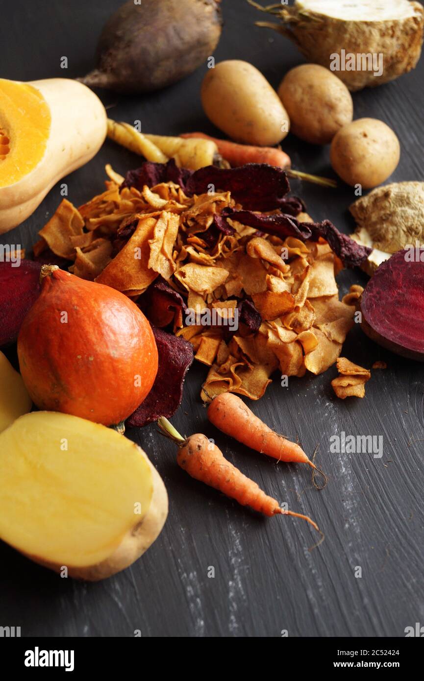 Organic sliced root vegetables and vegetable chips Stock Photo - Alamy