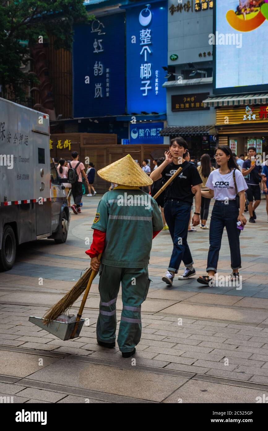 China street cleaner hi-res stock photography and images - Alamy