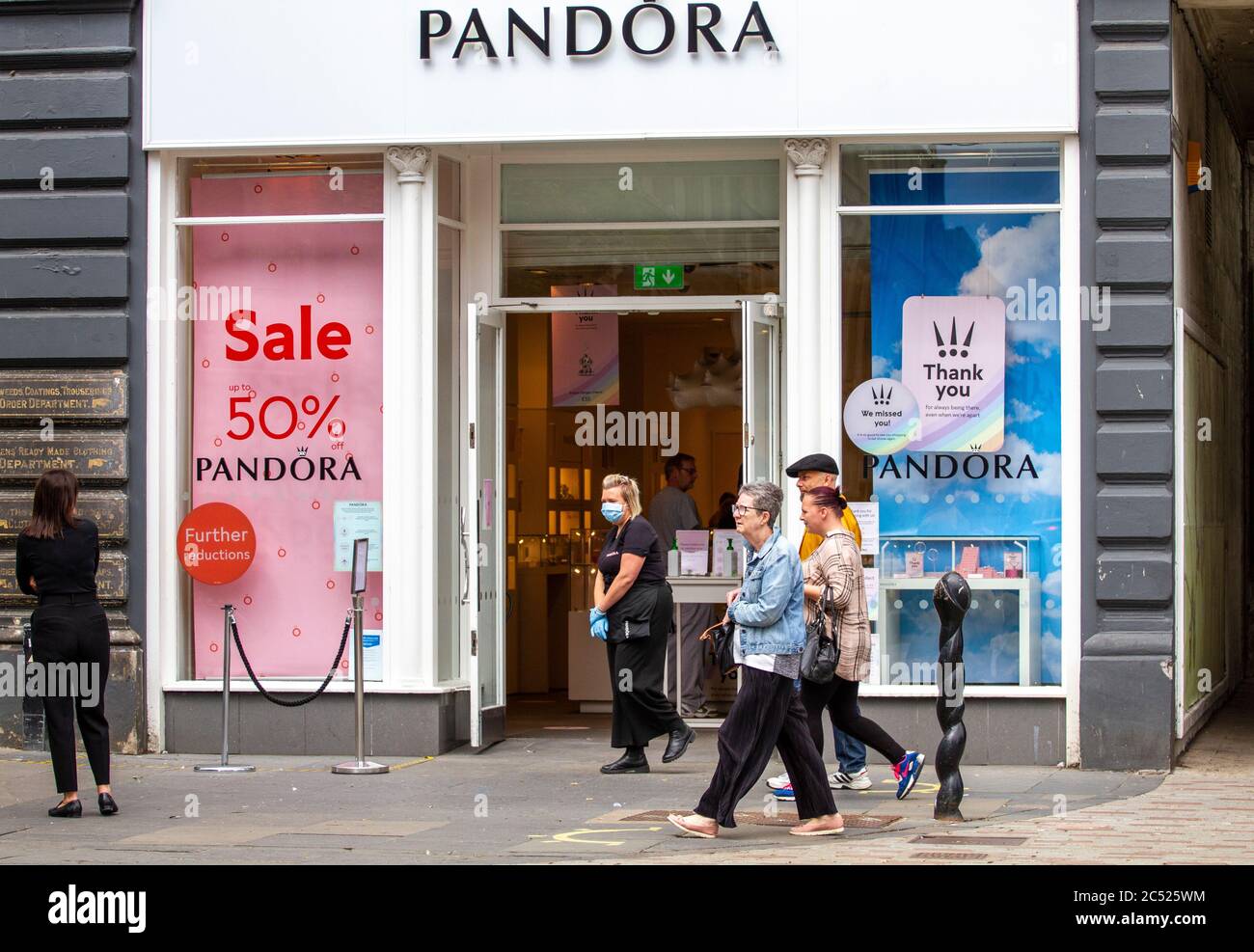 Shoppers shopping at overgate shopping centre hi-res stock photography ...