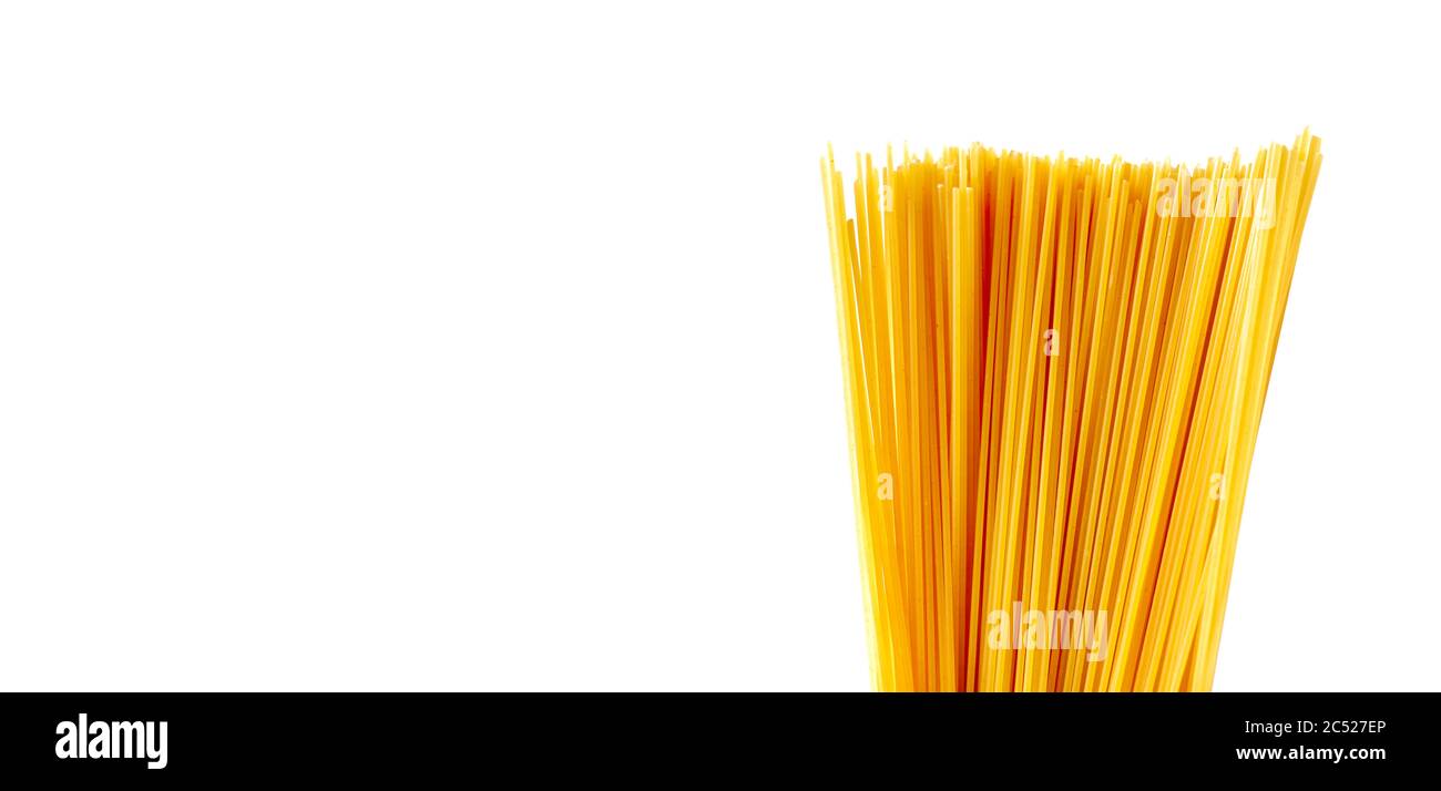 Uncooked raw spaghetti on isolated white background Stock Photo - Alamy