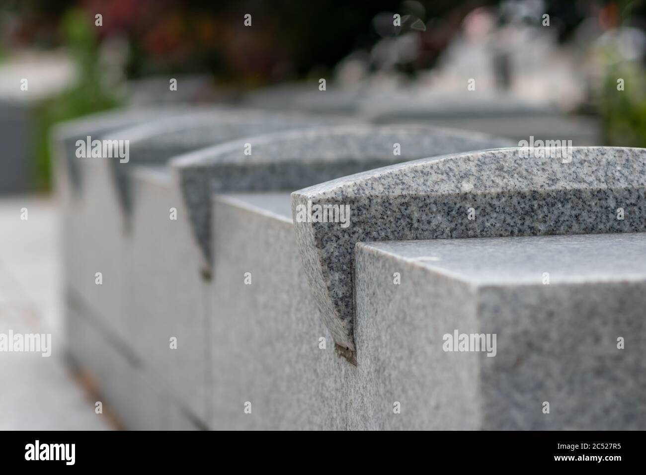 Hostile architecture - concrete bench with spike barriers to prevent ...
