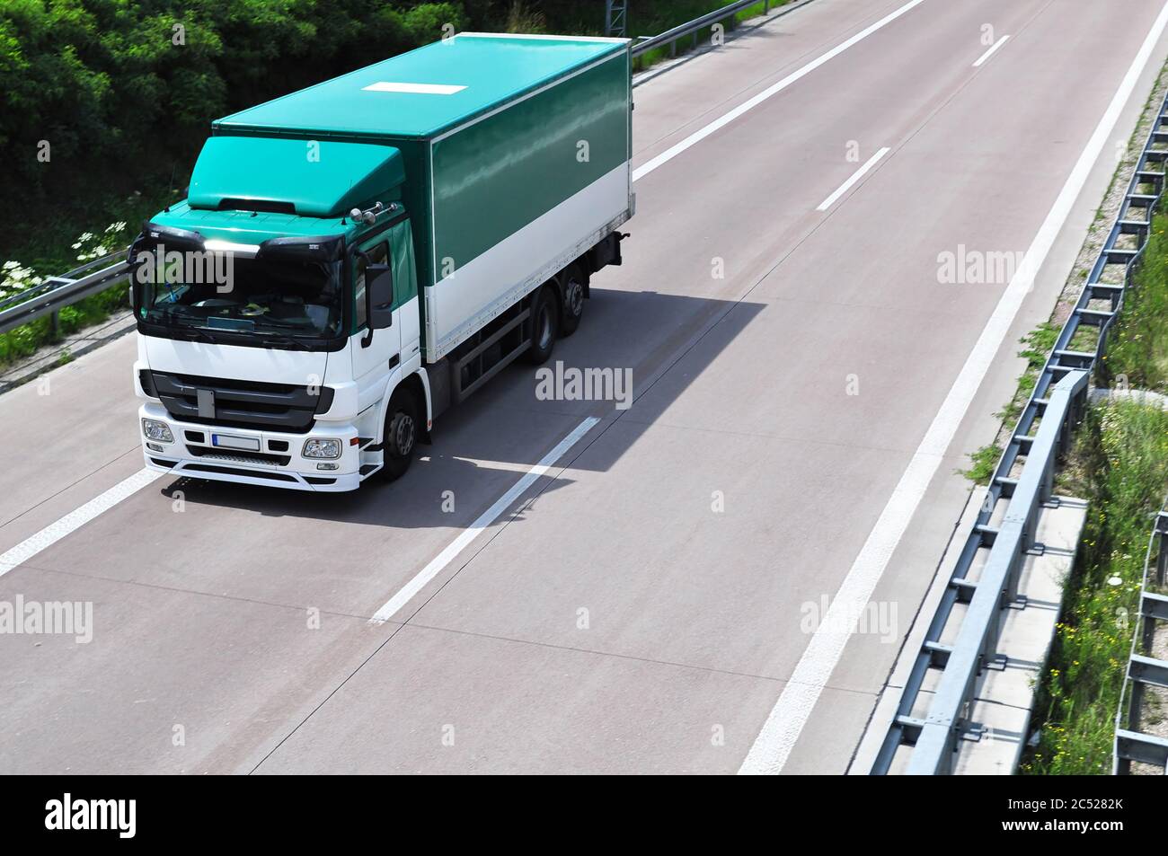 road transport of goods by truck - trade and logistics Stock Photo - Alamy