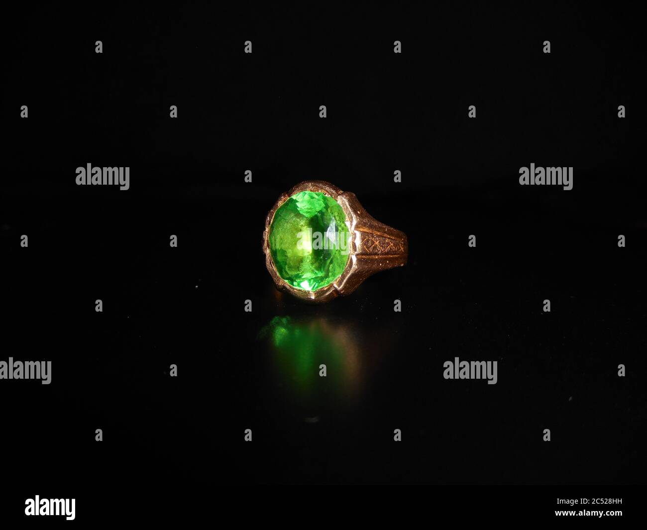 Women's Sparkling Ruby Fashion Ring on black background Stock Photo - Alamy