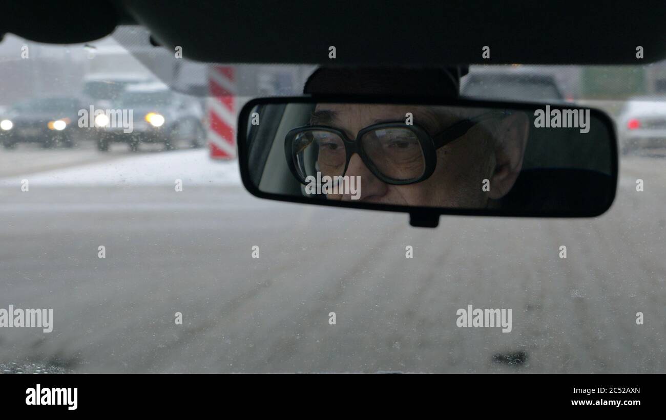 Daily driving in winter city Stock Photo - Alamy