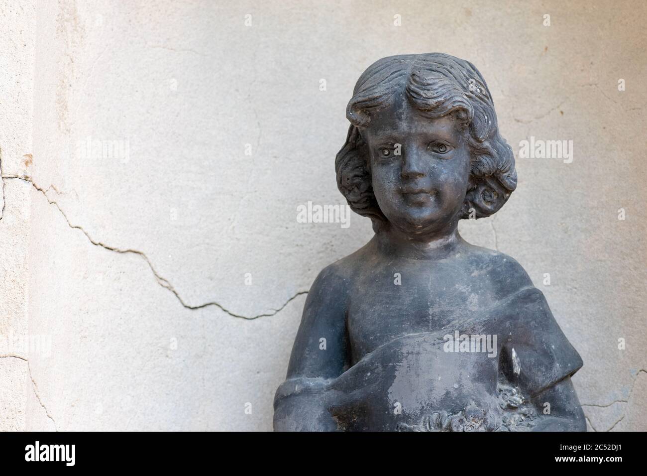 Ancient generic statue of girl in dark bronze metal Stock Photo - Alamy