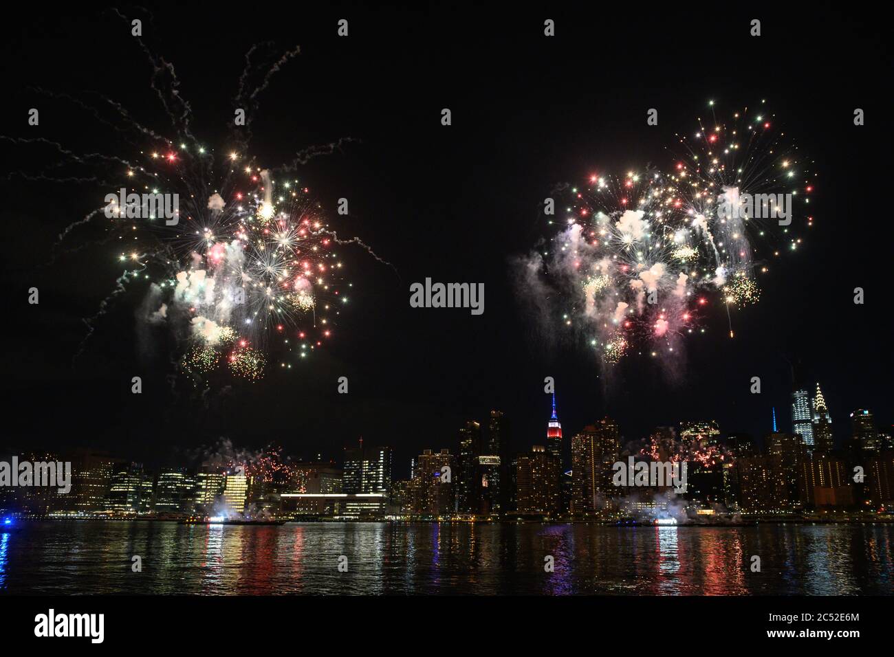 First night of Macy's fireworks display over the Empire State Building ...