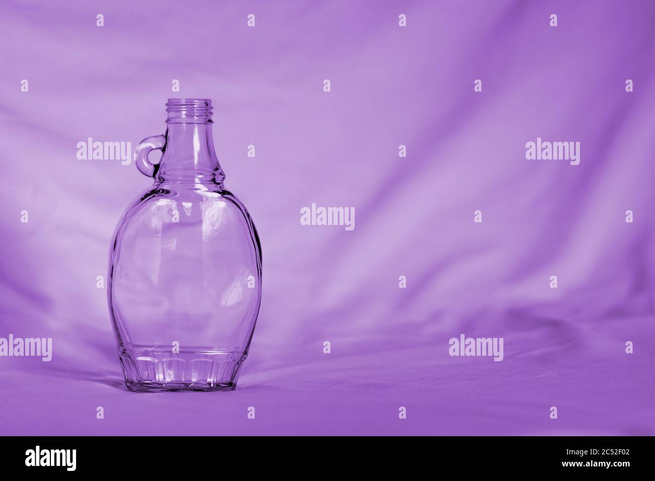 Violet syrup in bottle hi-res stock photography and images - Alamy