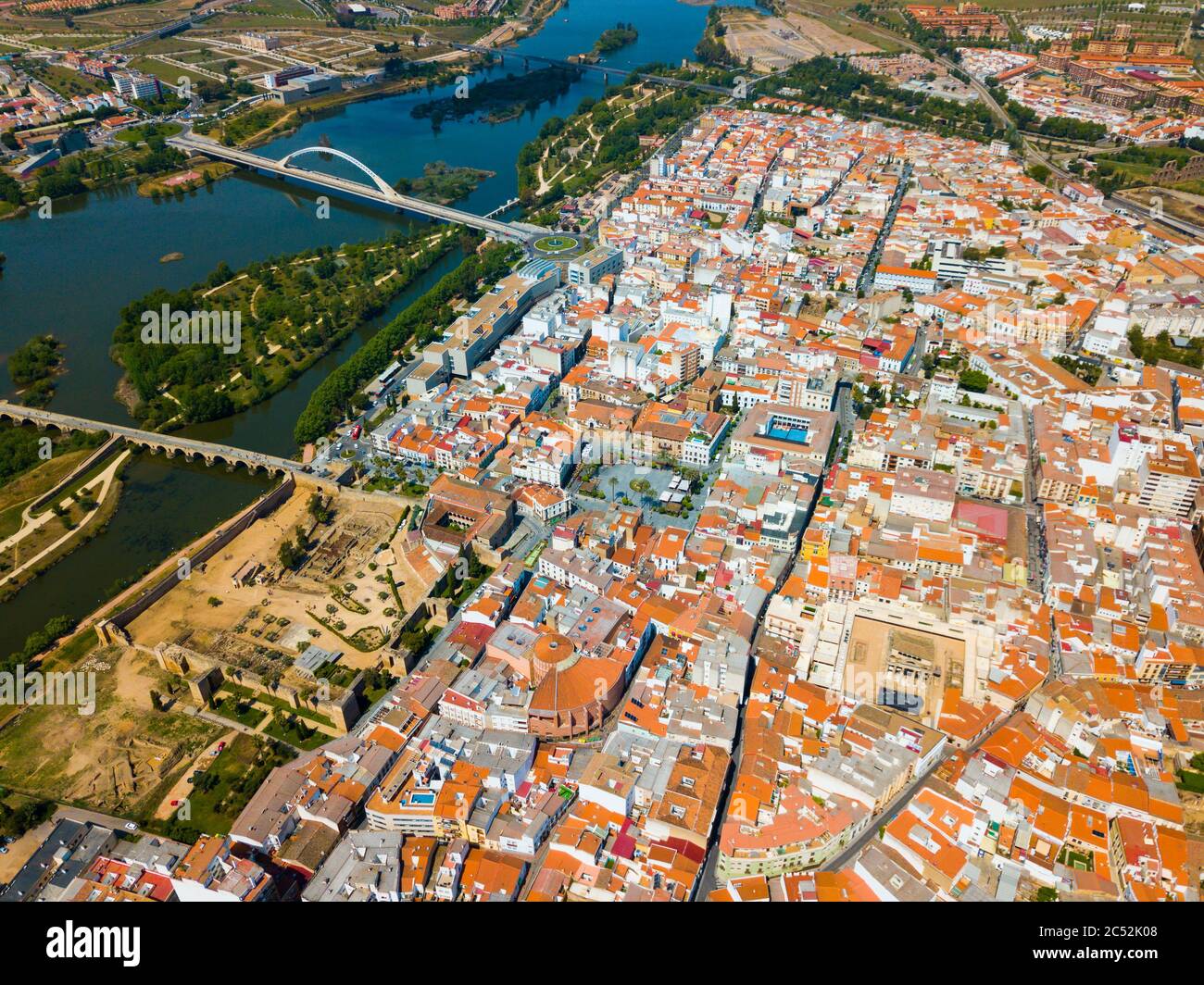 Scenic aerial view of Spanish city of Merida with ancient Roman Bridge ...