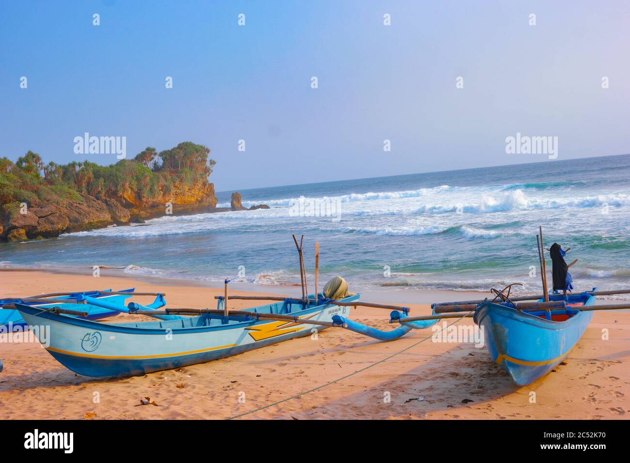 Small blue decks placed in the sand near the seawater Stock Photo - Alamy