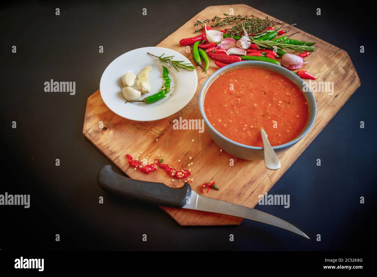 Red chilis blue bowl hi-res stock photography and images - Alamy