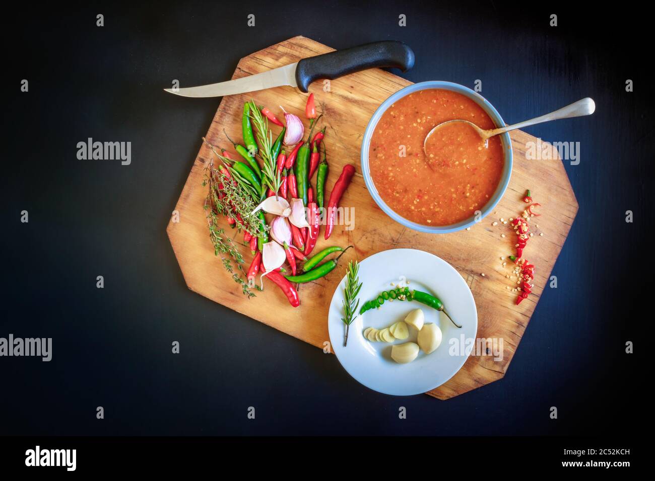 Red chilis blue bowl hi-res stock photography and images - Alamy