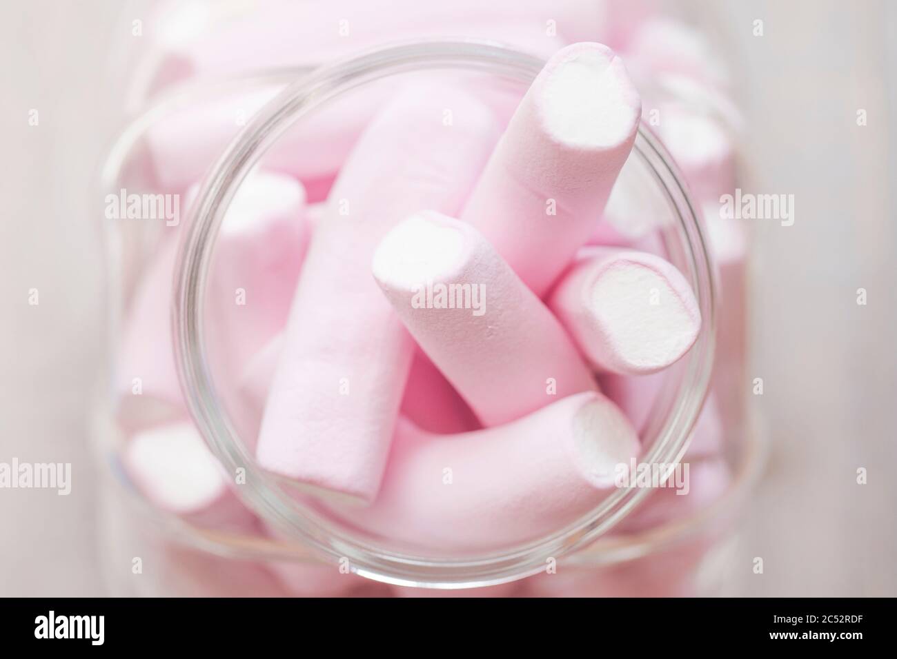 Glass jar filled with marshmallows Stock Photo - Alamy