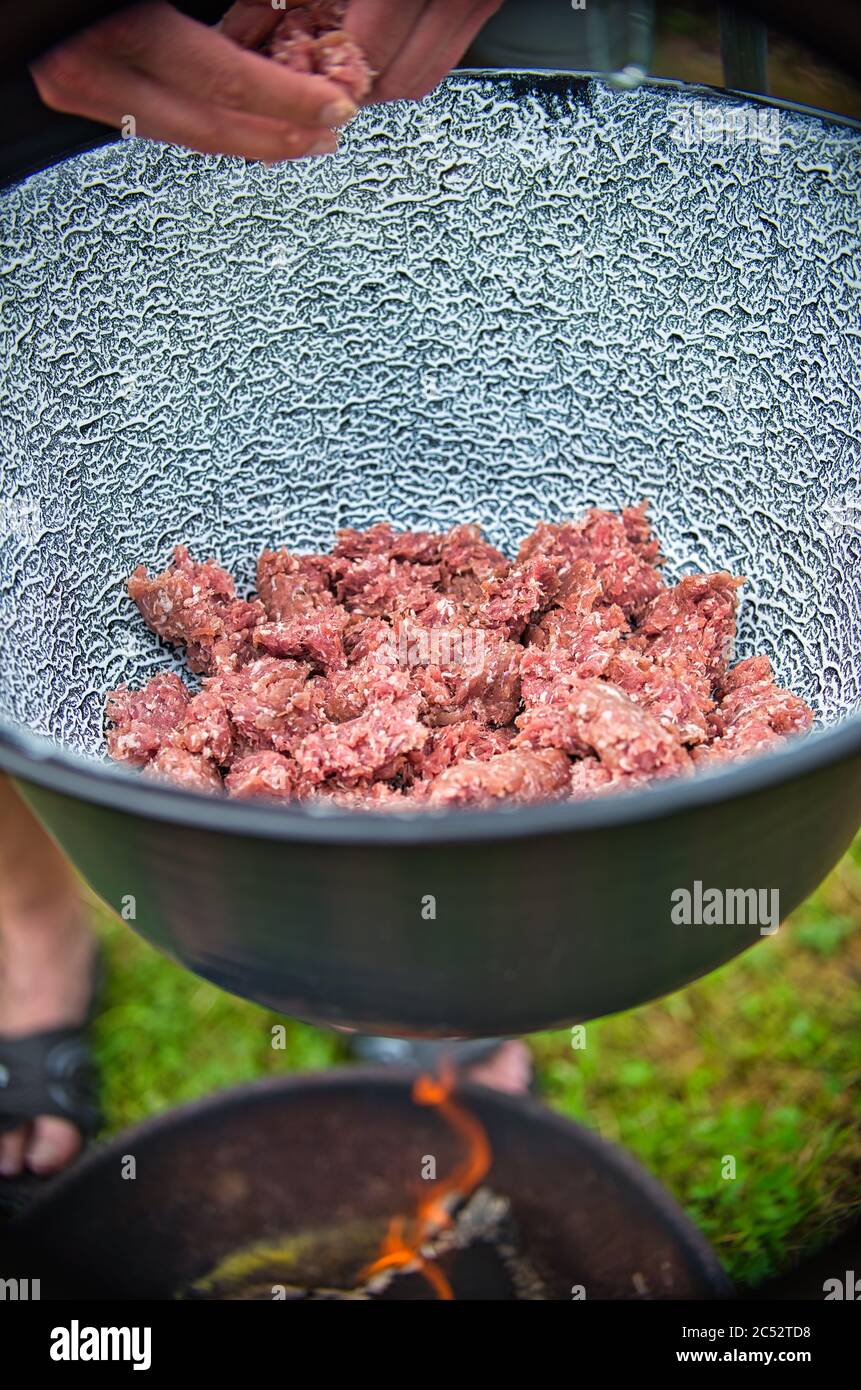 Chopped meat in a fire bowl Stock Photo - Alamy