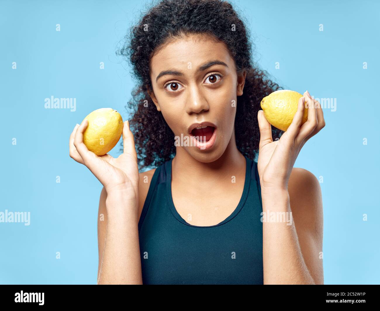 Young lady blue lips fruit hi-res stock photography and images - Alamy