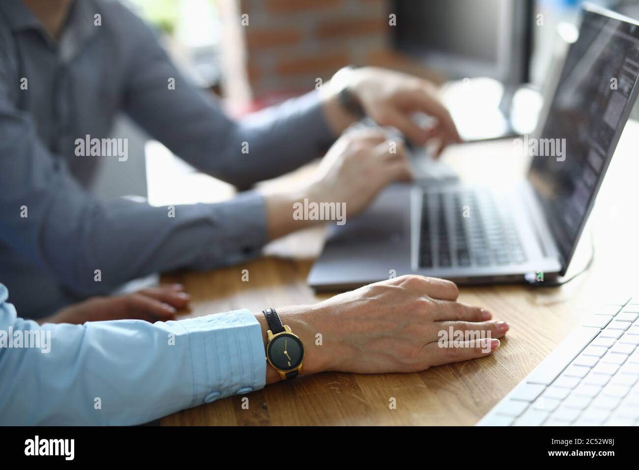 Staff working together Stock Photo - Alamy