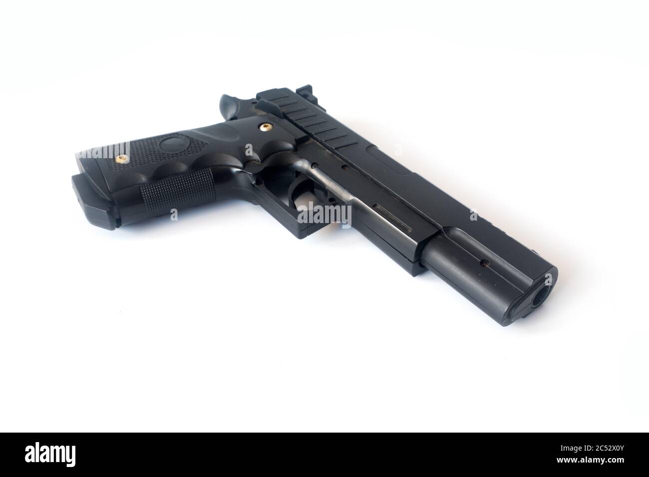 Close up of a generic hand pistol against white background. It is a ...