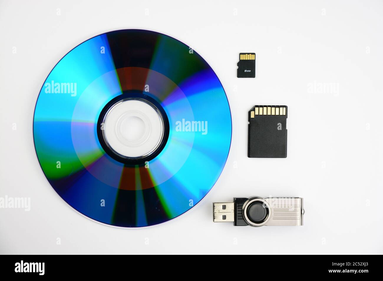 SD disk, a flash and a two chips isolated on a white background Stock ...