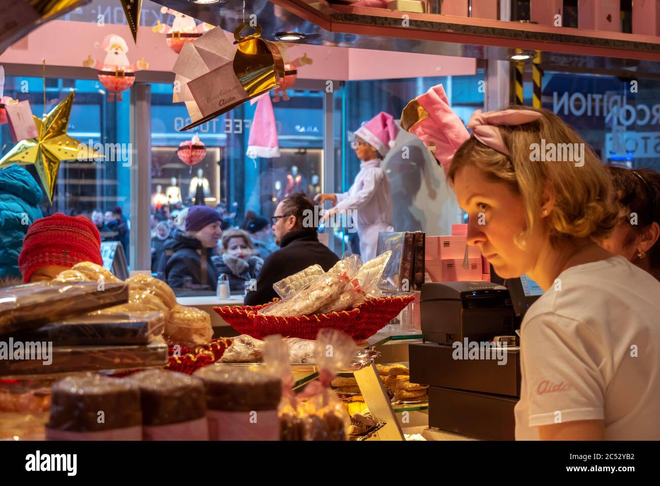 Festive holiday pastries and Christmas decorations are in full display ...