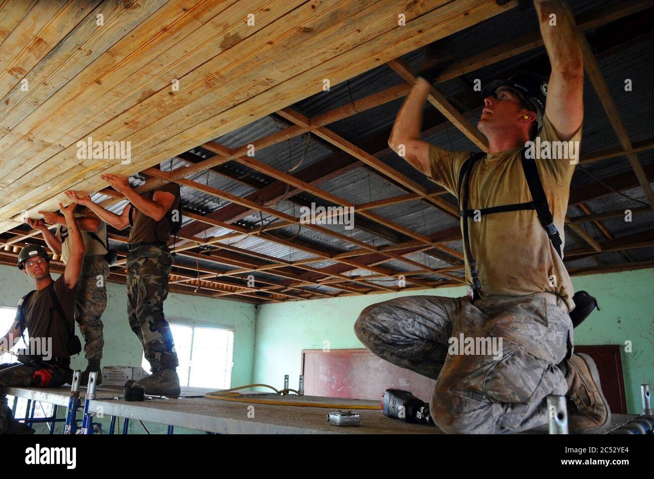 Improving the ceiling at a high school Stock Photo - Alamy