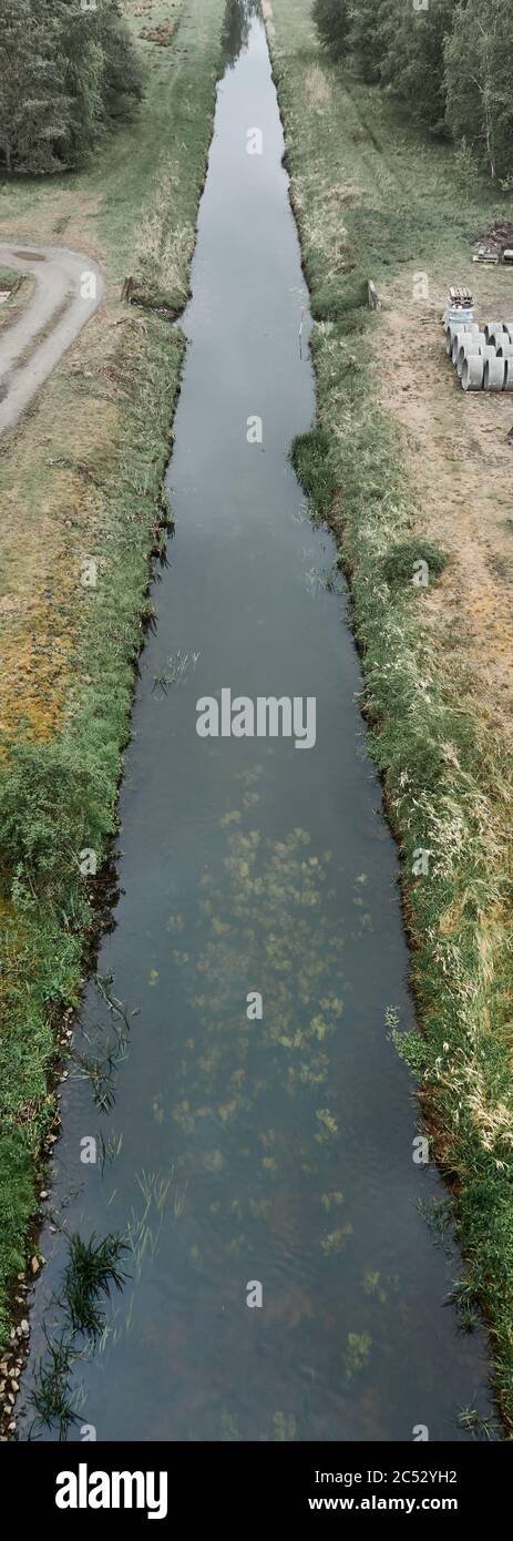 Destruction of nature through a straight drainage ditch with poor ...