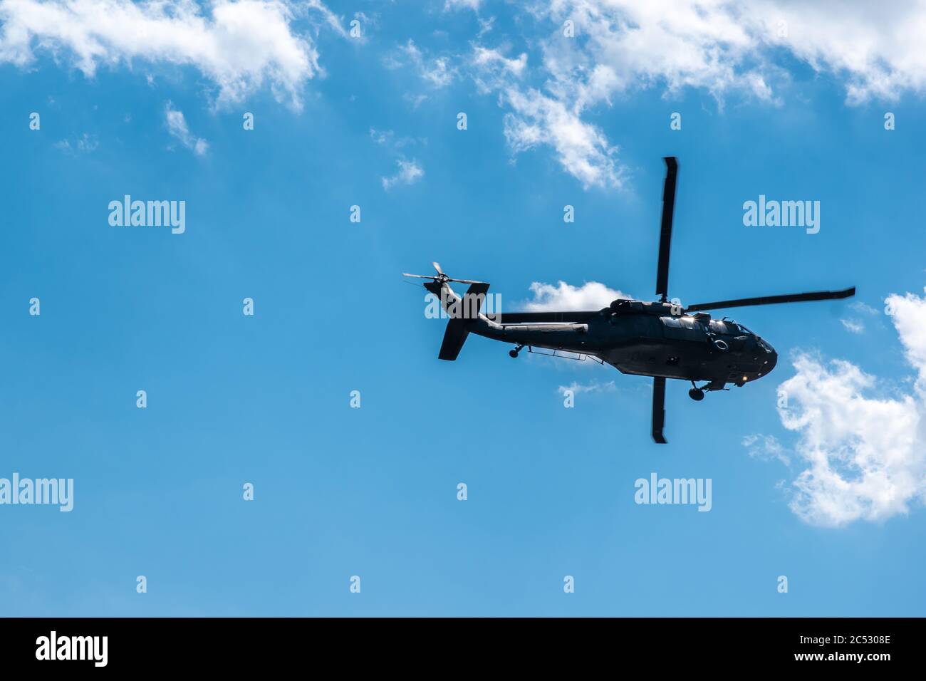 Military helicopter flies over Georgetown in Washington, D.C., as ...