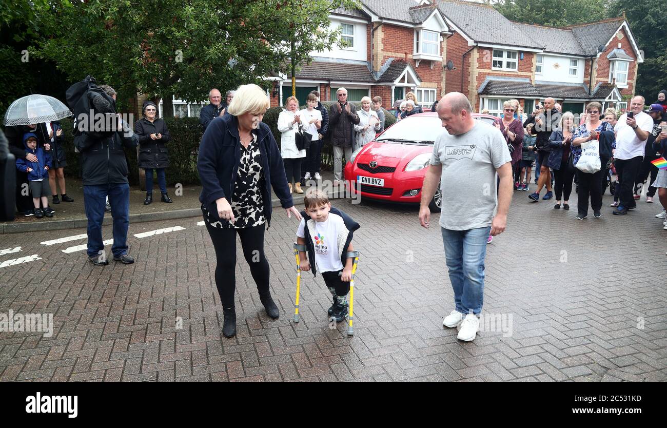 Tony Hudgell, who uses prosthetic legs, takes the final steps in his ...