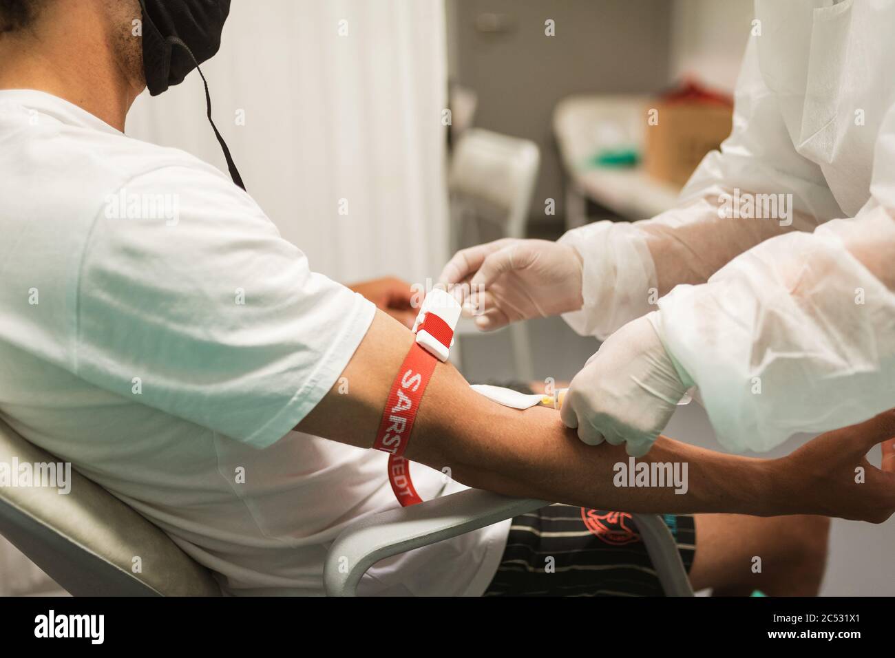 Taking blood samples from football players, coronavirus test Sars-CoV-2 ...