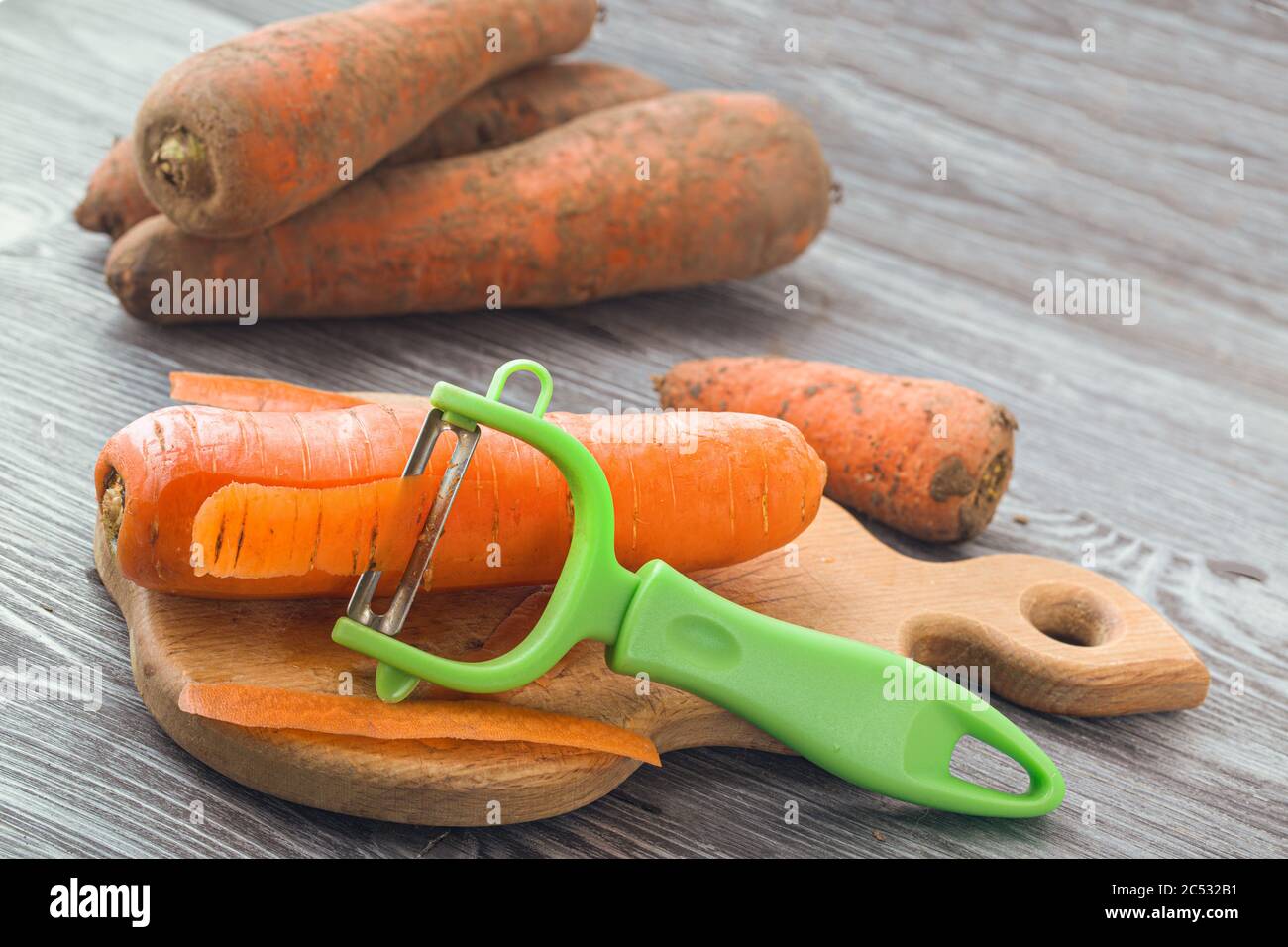 Cleaning carrots hi-res stock photography and images - Alamy