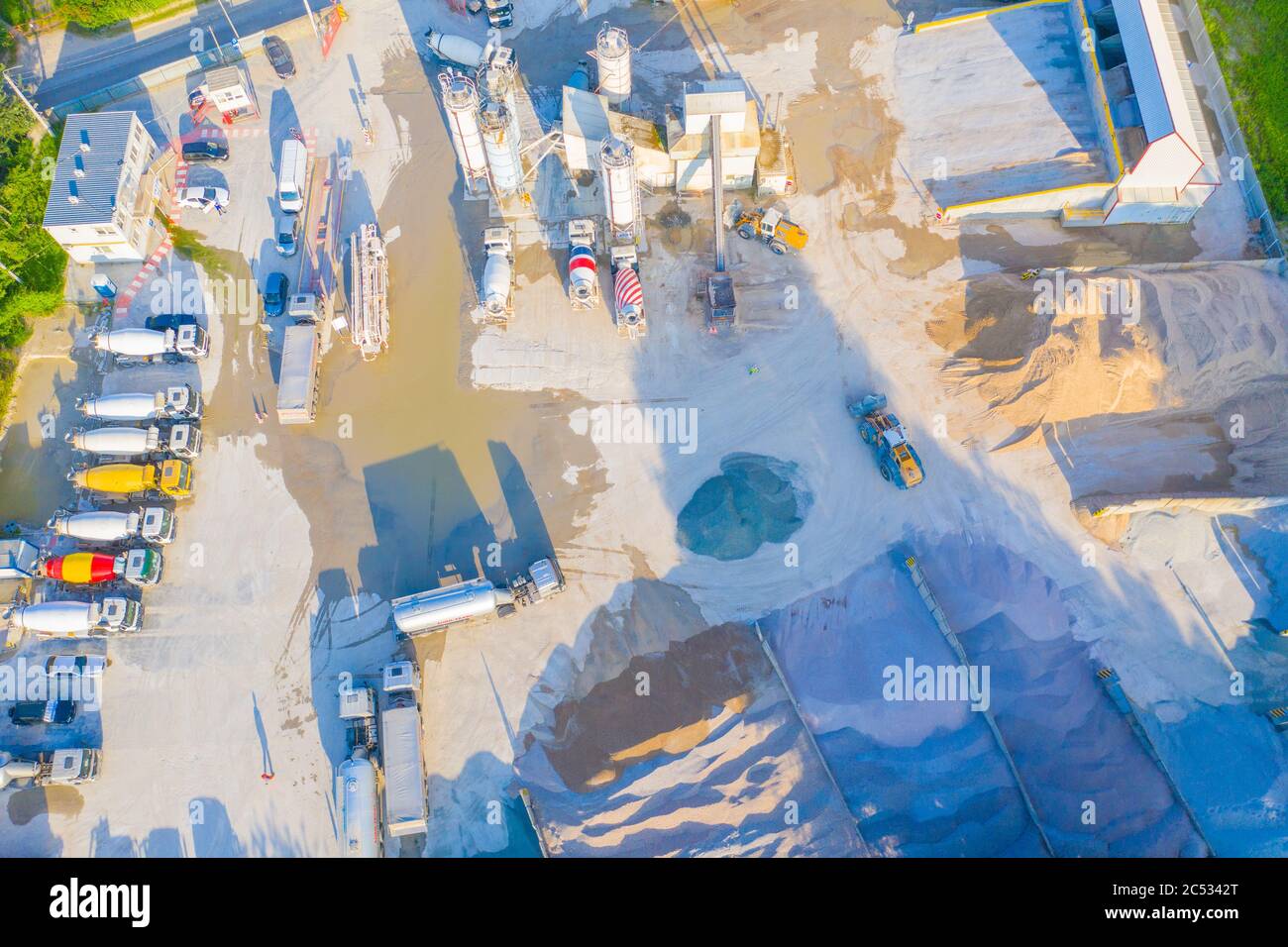 Aerial view of sandpit and factory plant producing sand materials for ...