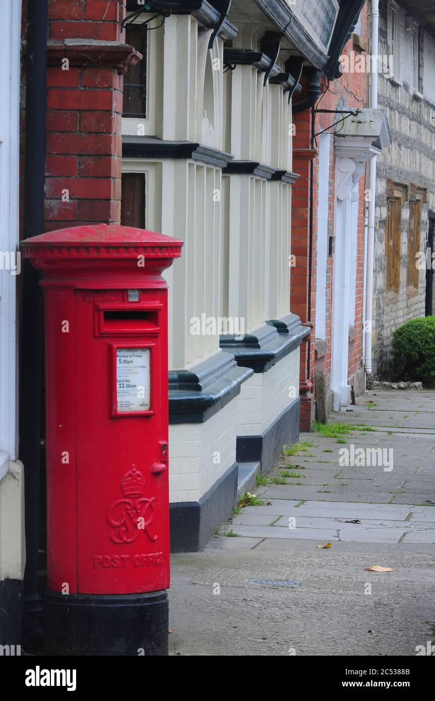 Red Royal Mail pillar box in Cerne Abbas, Dorset Stock Photo - Alamy