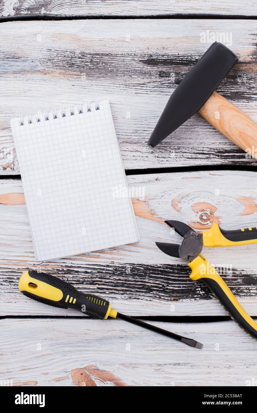 Blank notepad and construction workers instruments Stock Photo - Alamy