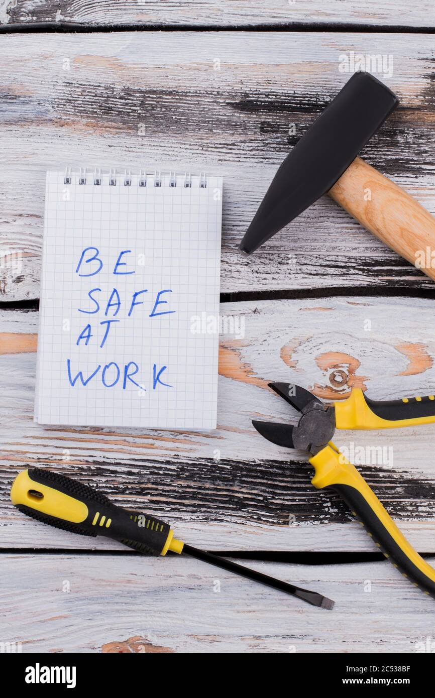 Be safe at work slogan and tools for repairing or construtcing Stock ...