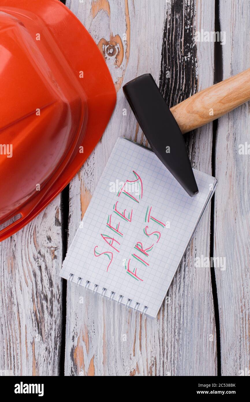 Safety first note and constructor's tools Stock Photo - Alamy