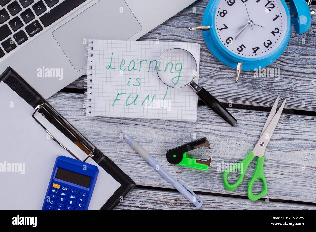 Learning is fun slogan and items for studying Stock Photo - Alamy