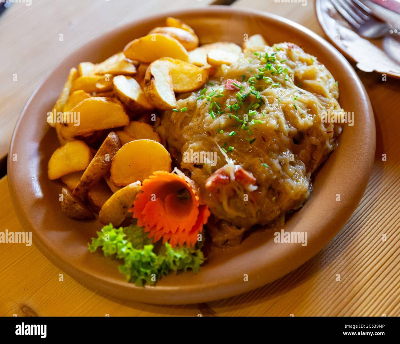 Pork ribs with stewed cabbage and potatoes - Polish dish Stock Photo ...