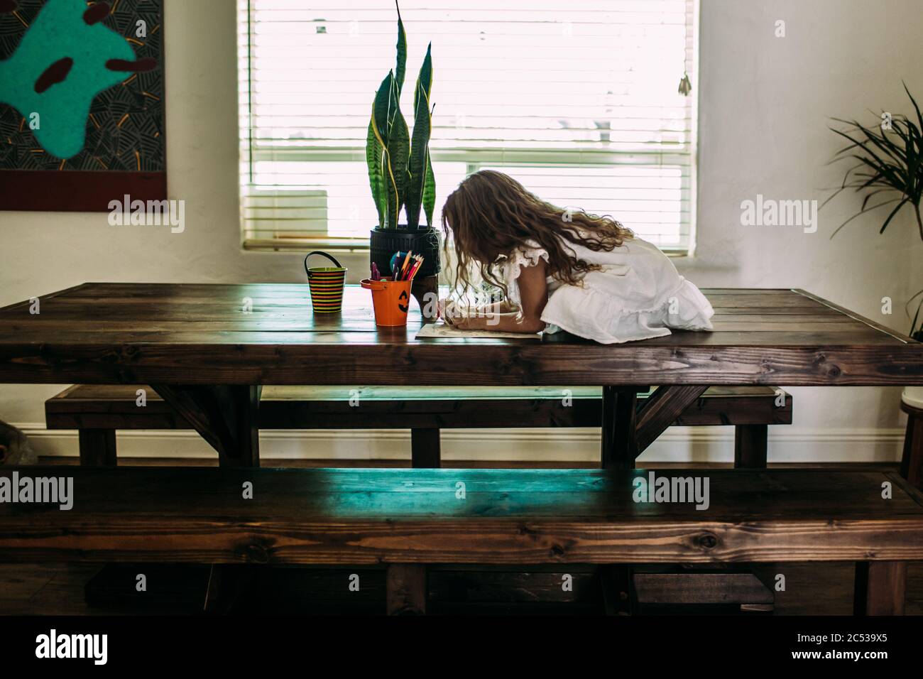 Girl sitting on top hi-res stock photography and images - Alamy