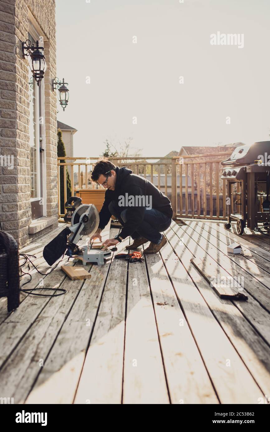 Man working deck hi-res stock photography and images - Alamy