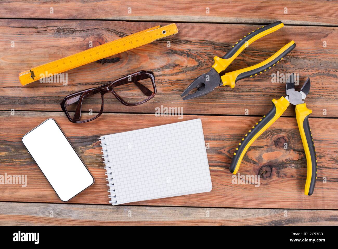 Surrounded by various tools hi-res stock photography and images - Alamy
