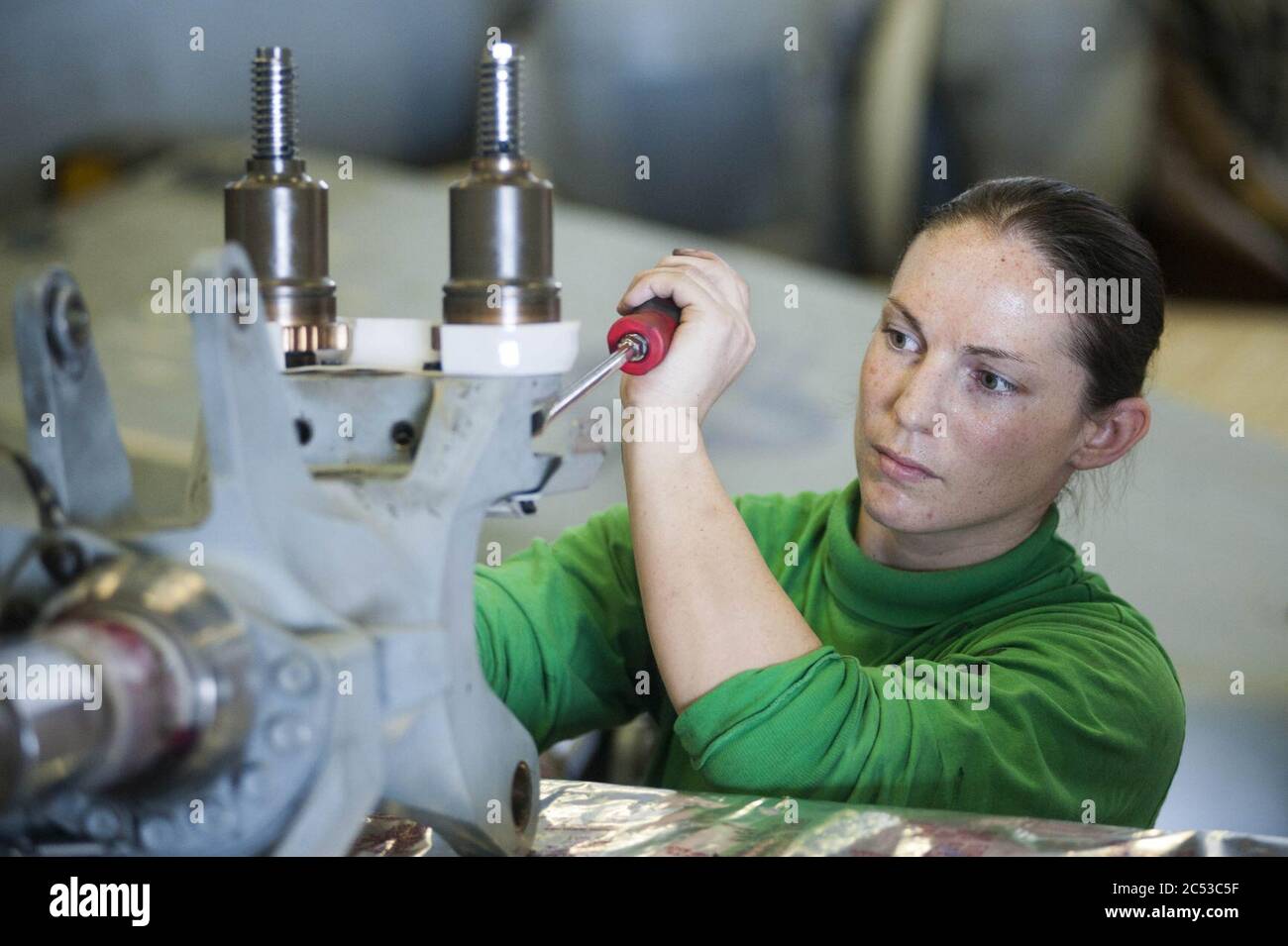 Inspecting a spindle 131202 Stock Photo - Alamy