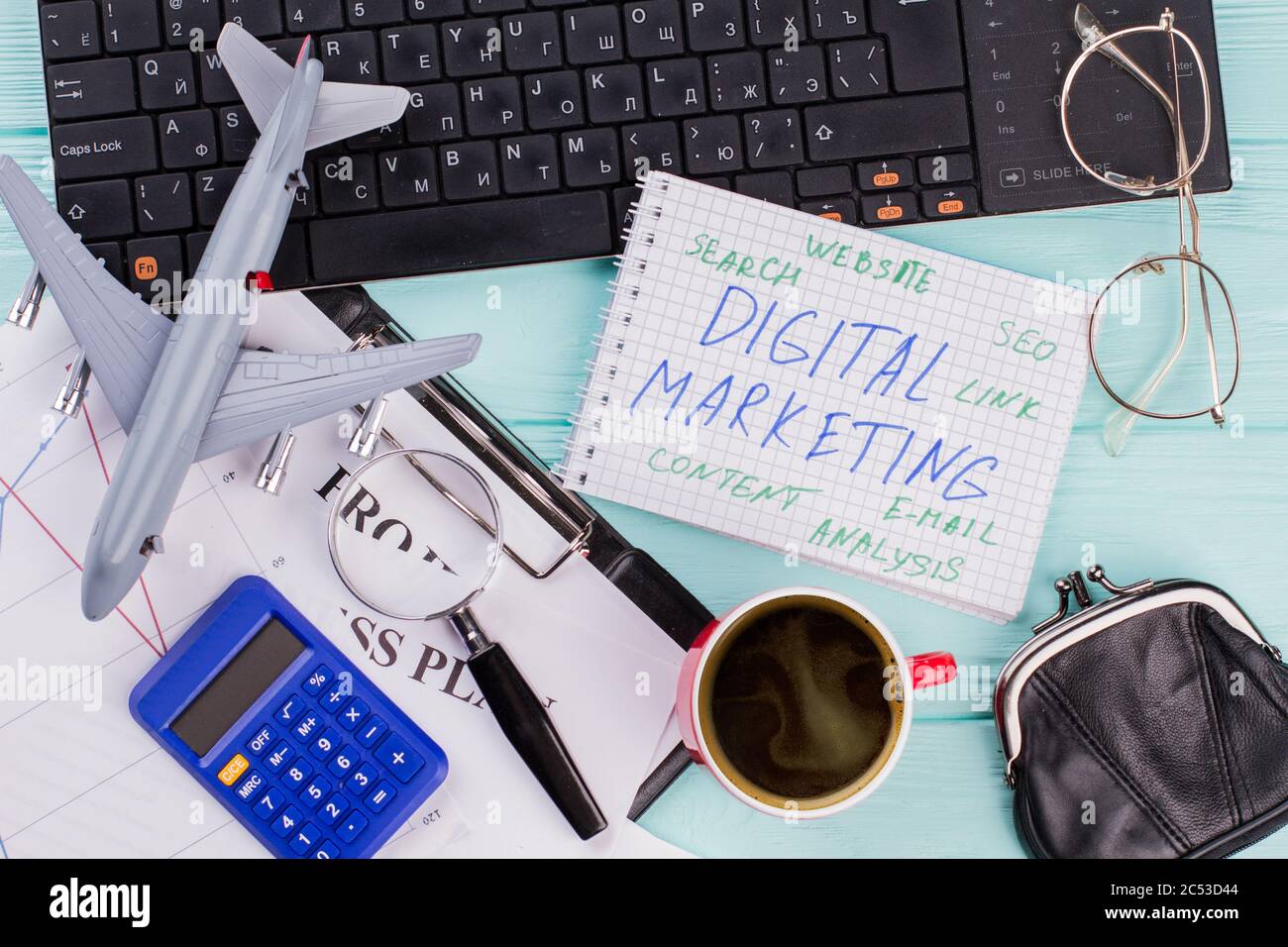 Digital marketing on notepad and various office supplies Stock Photo ...