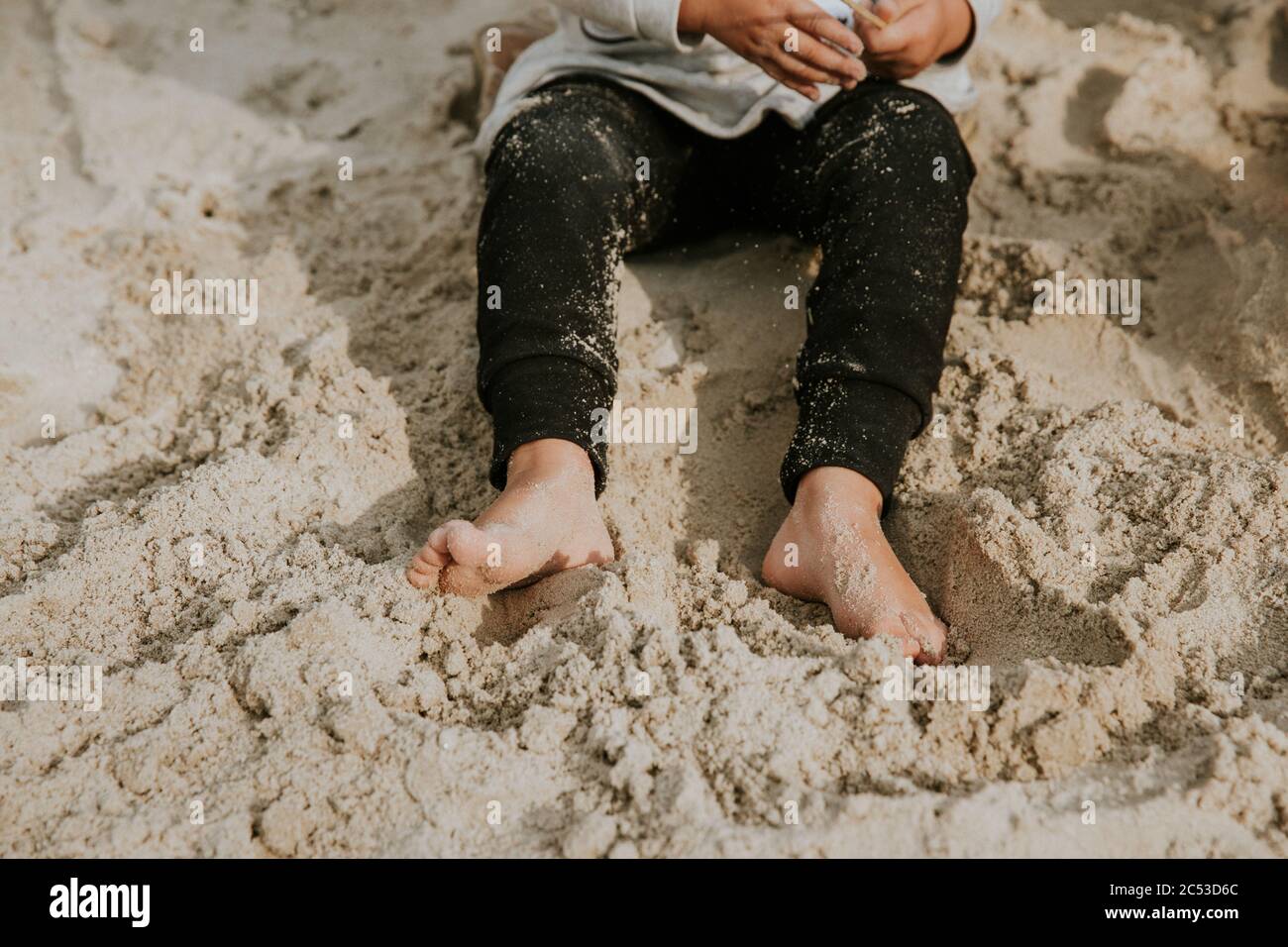 Child feet sand hi-res stock photography and images - Alamy