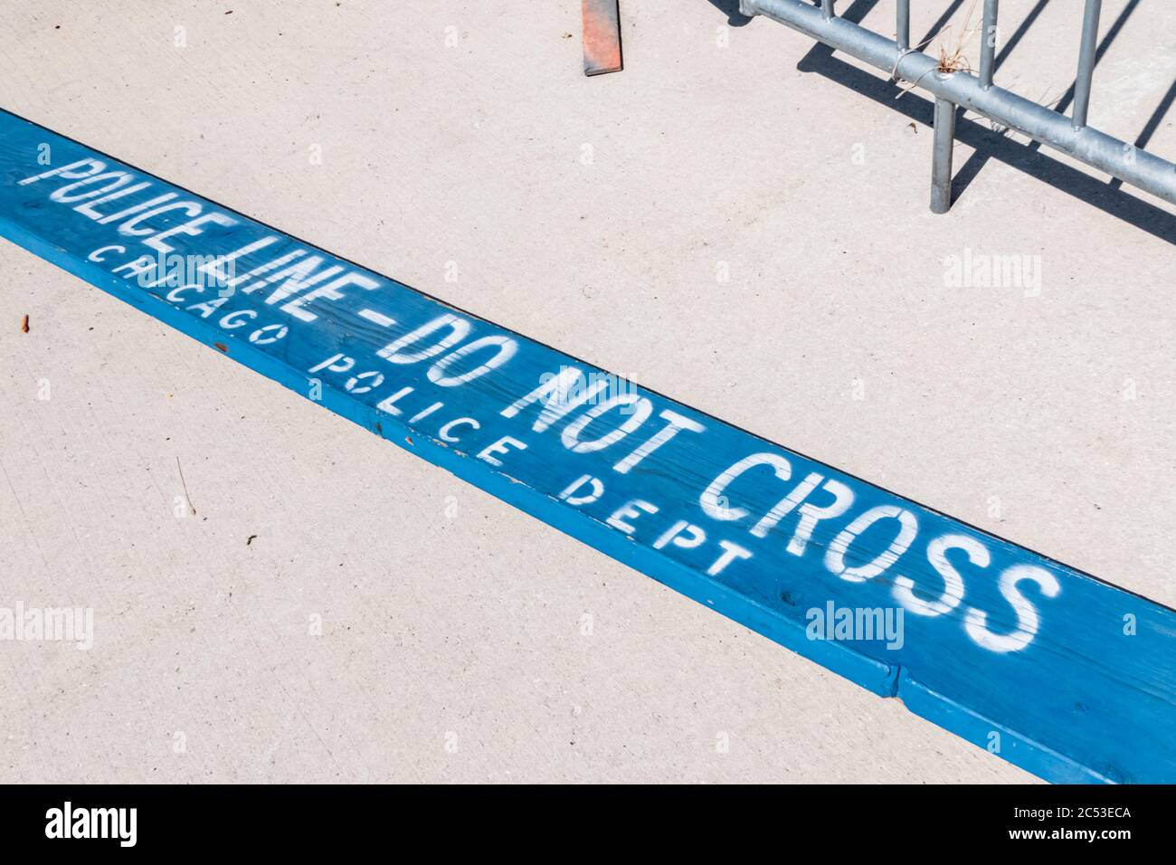 Police line do not cross barricade horse lying on the ground from the ...