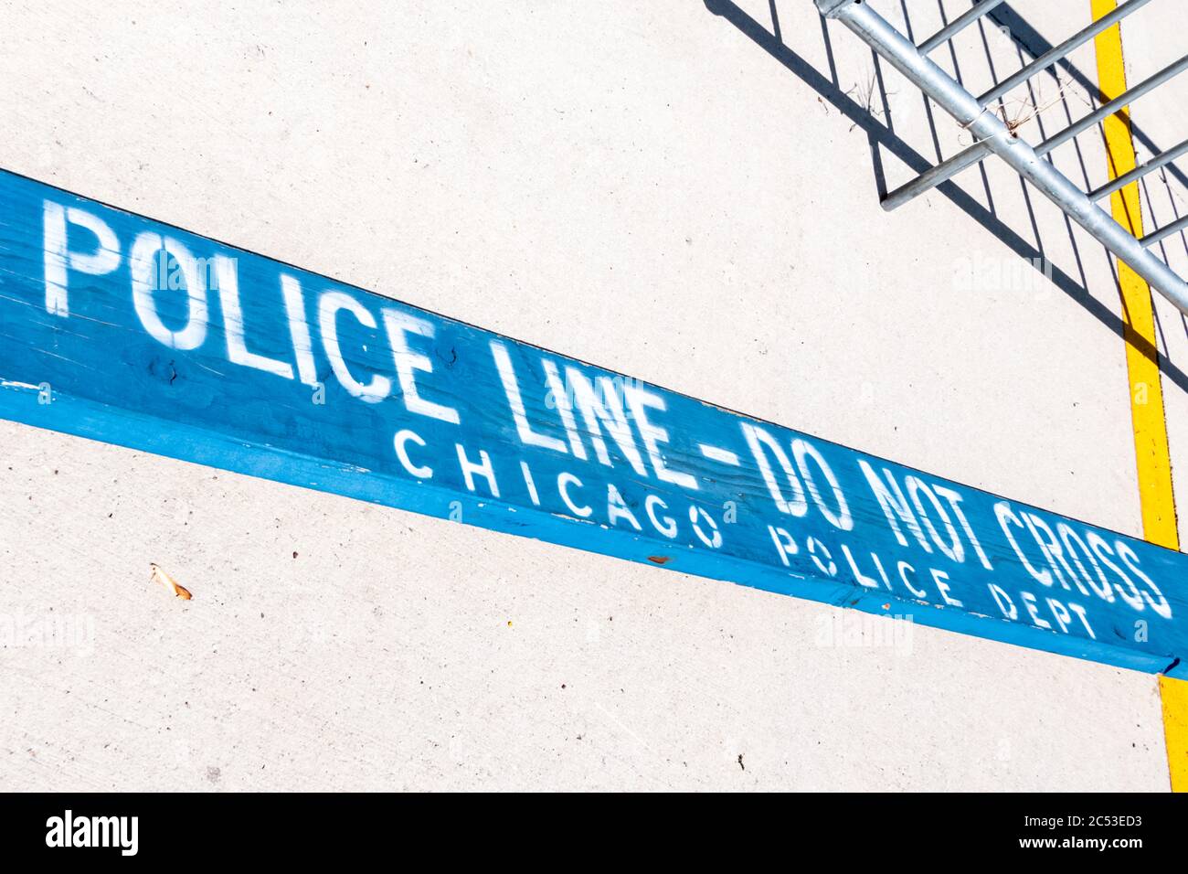 Police line do not cross barricade horse lying on the ground from the ...