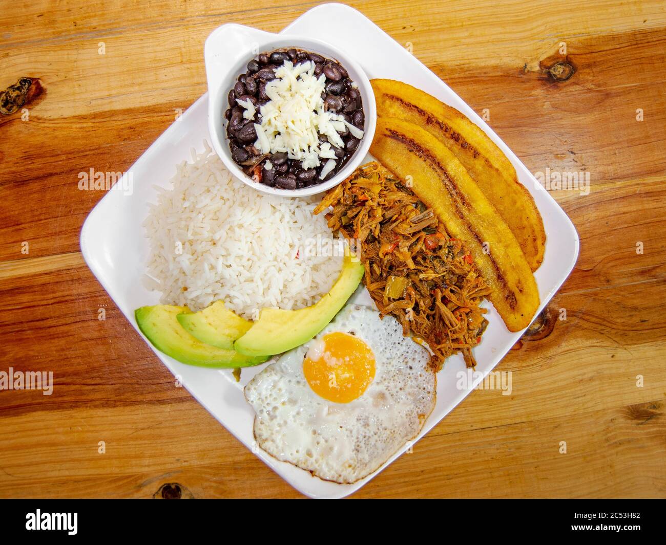 Traditional Venezuelan pabellon dish made with beans, rice, beef and ...